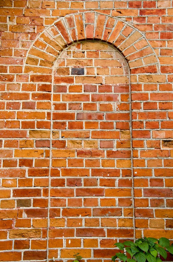 Red brick wall with arch stock photo. Image of mortar - 2335868