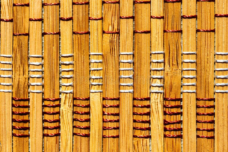 A Background of Bamboo Stems Intertwined with Threads Stock Image ...