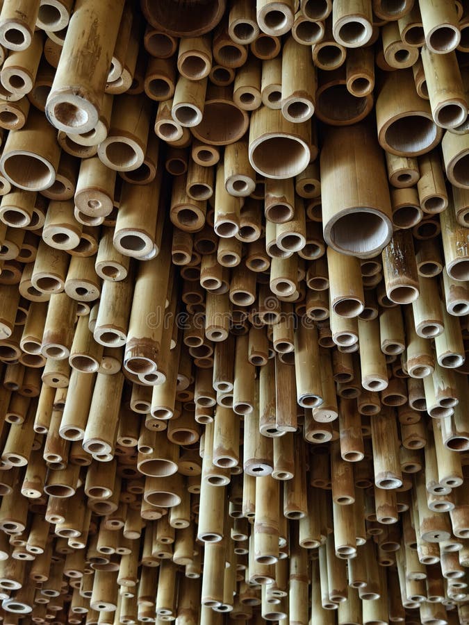 Background of Bamboo Tubes are Arranged in a Stack on Top of One ...