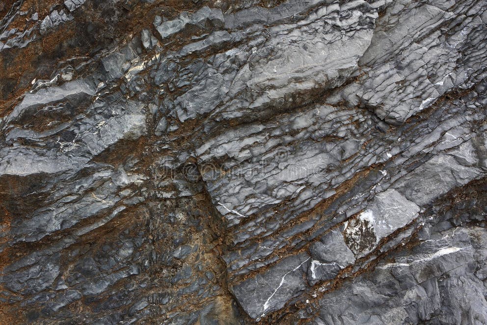 Background on the Basis of the Texture of Rock. Black and Brown Stone ...