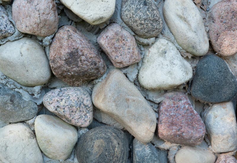 A Background of Beautiful Multi-colored Textured Stones of Different ...