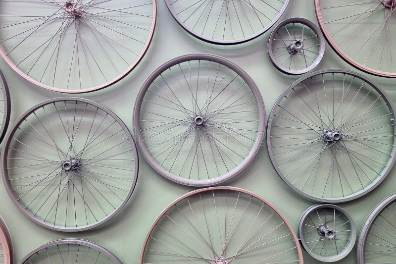 Background of Bicycle Wheels on the Wall. Stock Image - Image of tire ...