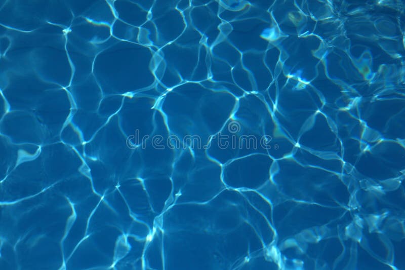 Background of Blue and Light Blue Tones of Swimming Pool Water with Light Reflections without ...