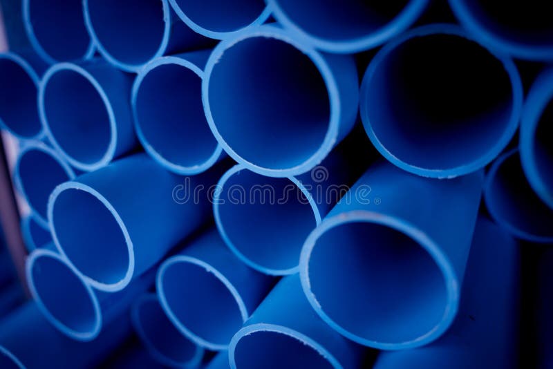 Background of the Blue Plastic Pipes in Stacked Stock Photo - Image of ...