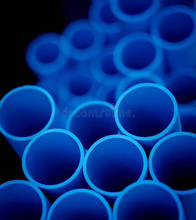 Background of the Blue Plastic Pipes in Stacked Stock Photo - Image of ...
