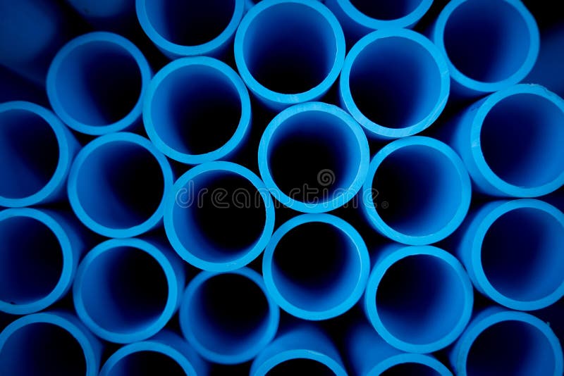 Background of the Blue Plastic Pipes in Stacked Stock Photo - Image of ...