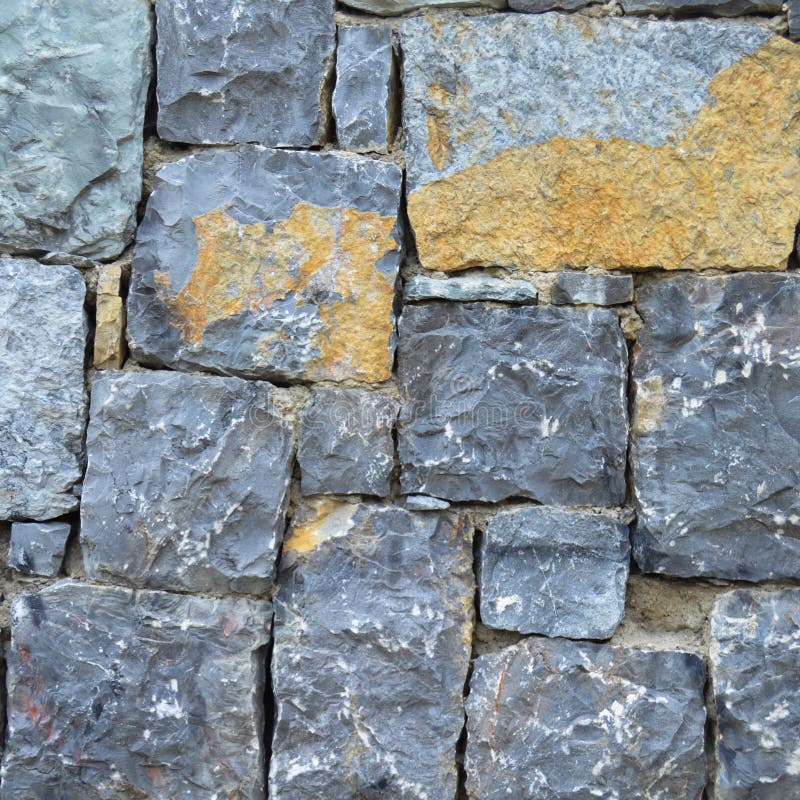 Fine cut blue stone wall stock photo. Image of concrete - 244947266