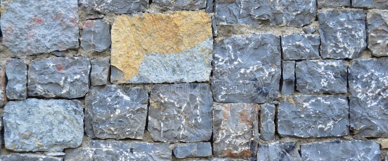 Fine cut blue stone wall stock photo. Image of construction - 245275208