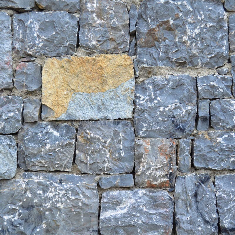 Fine cut blue stone wall stock image. Image of built - 245275241