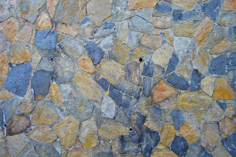 Fine Cut Blue and Yellow Stone Wall Stock Photo - Image of build ...