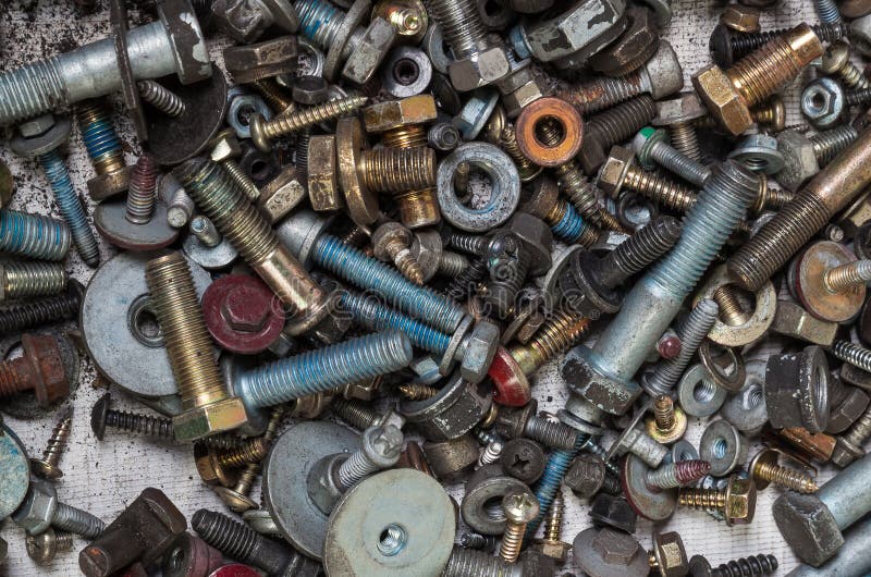 Background of Bolts and Nuts of Different Lengths and Threads. Industry ...