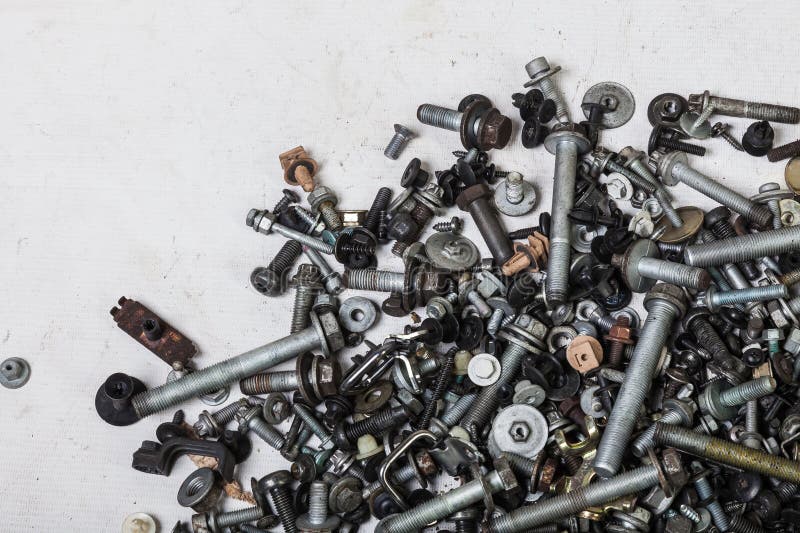 Background of Bolts and Nuts of Different Lengths and Threads. Industry ...