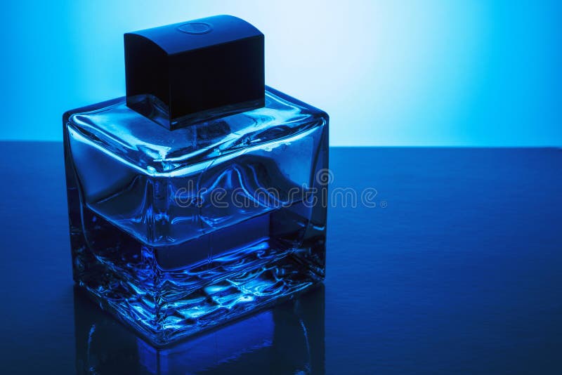 Background with Bottle of Perfume with Blue Liquid, Backlit. Stock ...