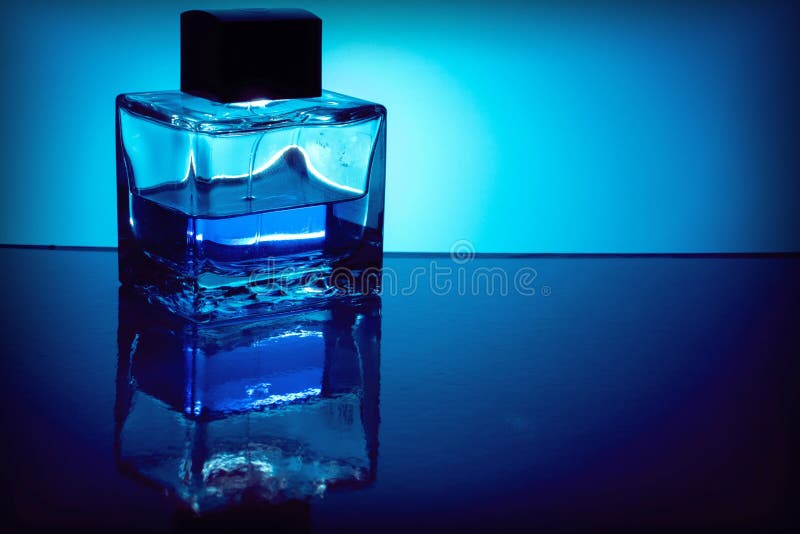 Background with Bottle of Perfume with Blue Liquid, Backlit. Stock ...