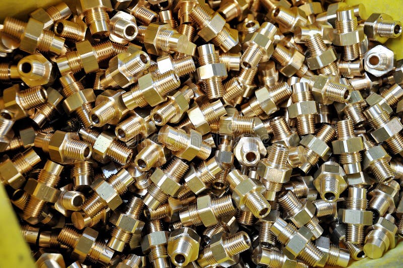 Background of Brass Fittings Machined with CNC Lathe Stock Photo ...