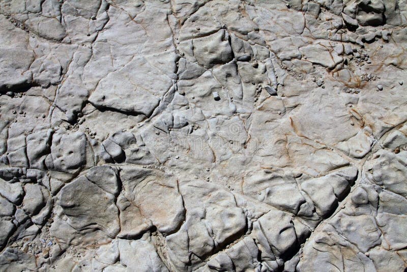 Bright Red Rocks Forming Barrier Along Charlottetown Harbour Stock ...