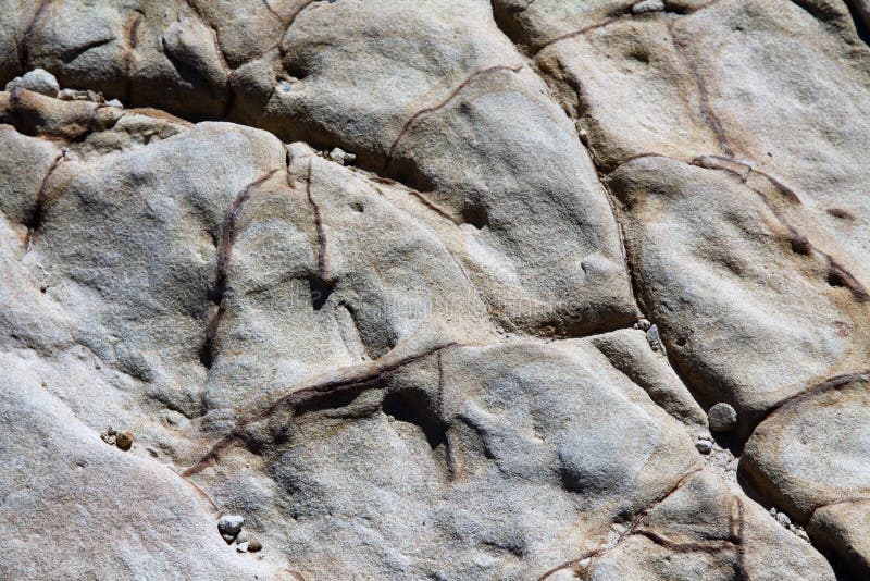 Bright Red Rocks Forming Barrier Along Charlottetown Harbour Stock ...