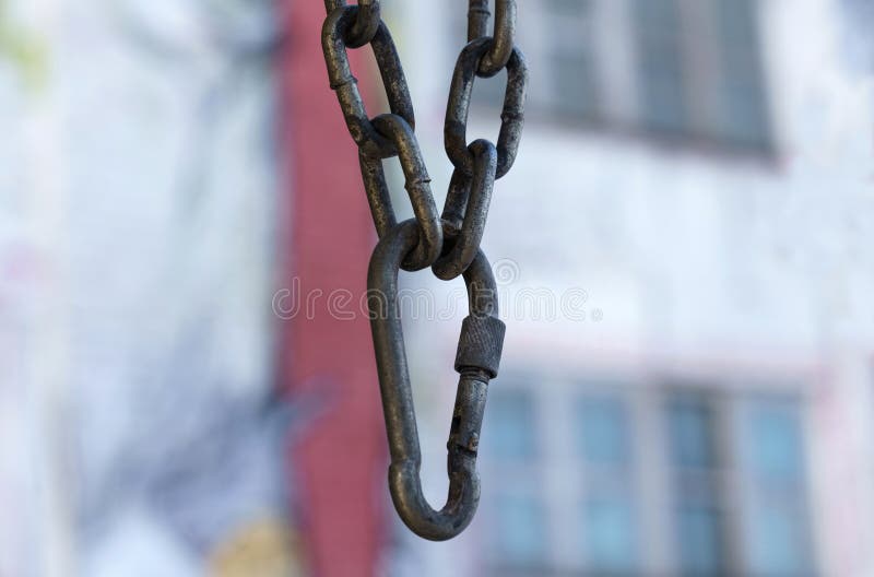 In the Background of the Building Hangs a Chain and a Carbine. Stock ...