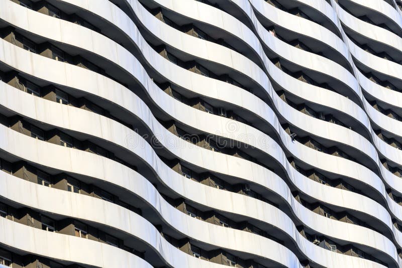 The Background of the Building with a Wavy Facade Stock Photo - Image ...