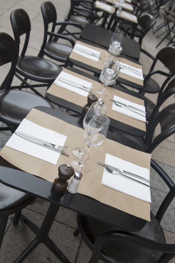 Cafe Tables and Chairs stock image. Image of setting - 104909521