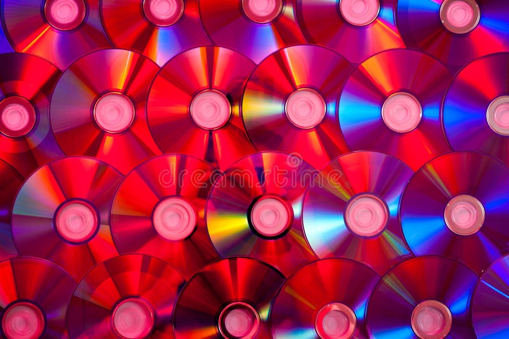 Background CD and DVD Discs Laid Out on a Flat Surface. Background for ...