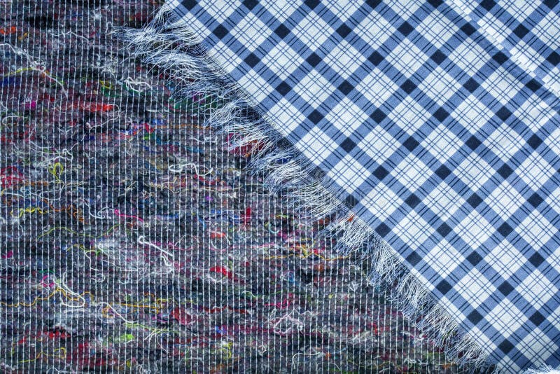 Background of Checkered Fabric Lying on a Piece of Quilted Felt Stock ...