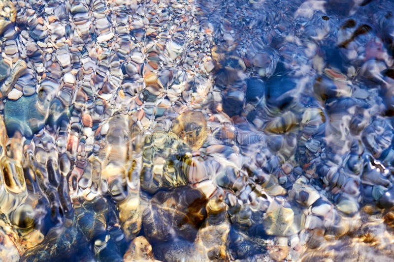 Background of Clear Spring Water Running among Stones Stock Photo ...