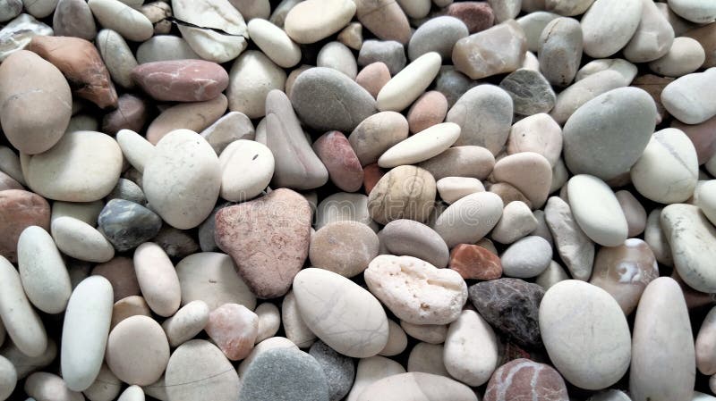 Background of a Collection of Pebbles Arranged in Texture Stock Image ...
