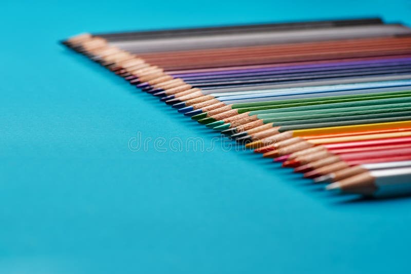 Background from Color Pencils on Blue Paper Stock Image - Image of ...
