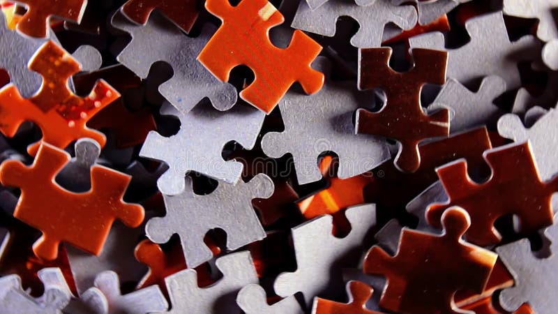 Colored Puzzle Pieces that Rotating Counterclockwise - Close-up Stock ...