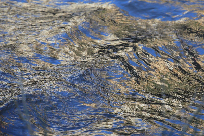 Background of Colorful and Iridescent Reflections on the Surface of ...