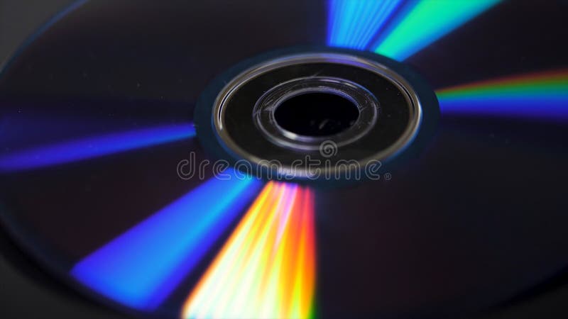 Background of Compact Disks or Dvds. Glare of Light on the Disk DVD ...