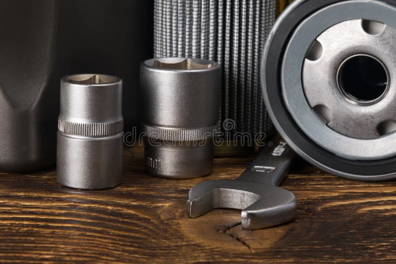 Consumables for Car Maintenance, on a Black Table, Brake Pads, Spark ...