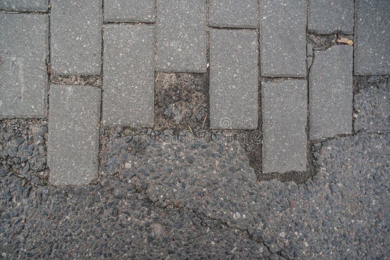 Background from the Connection of Asphalt and Tiles from Above Stock ...