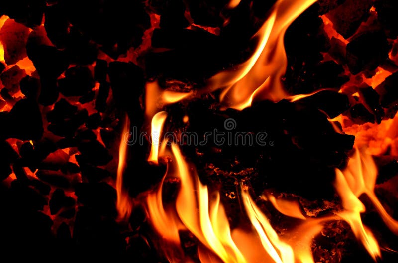 The Background Consists of a Plastic Mass Burning on Coal. Stock Photo ...