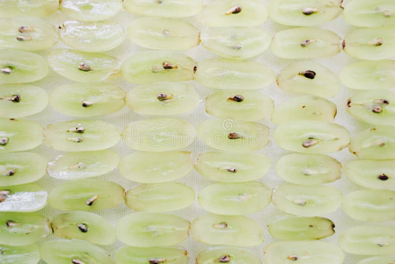 Background of Cut Halves of Ripe Grapes on a White Table. Summer Season ...