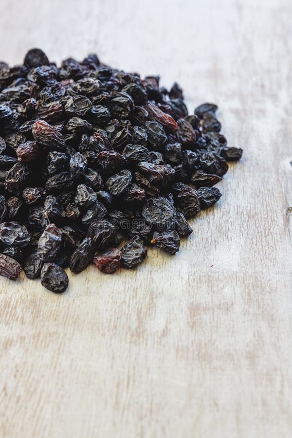 Background from Dark Blue Raisins. Close-up Stock Image - Image of ...