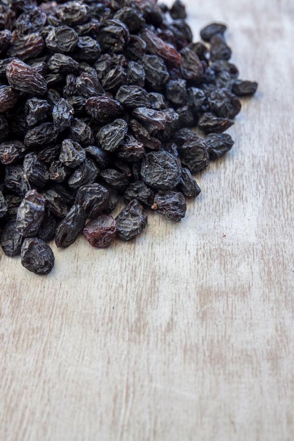 Raisins close up image stock photo. Image of isolated - 221688200