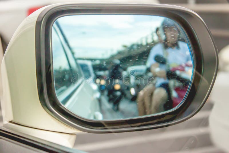 Background Defocus Reflection of a Traffic Jam in a Sideview Mirror ...