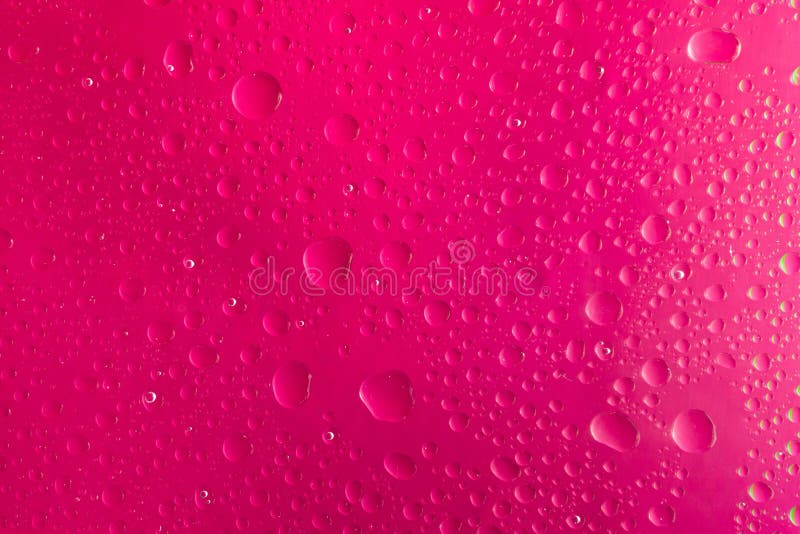 Background for Design of Water Drop Close Up on a Pink Surface Stock ...