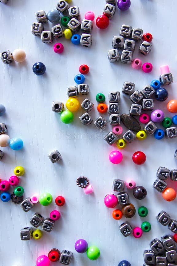 Background from Different Colored Beads with Numbers and Symbols Stock ...
