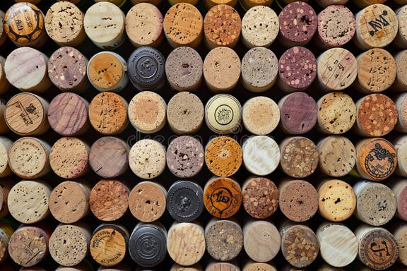 A Background of Different Types and Colors of Wine Cork Stations ...