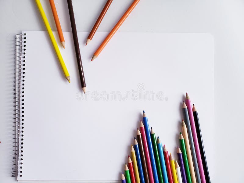 Background with Drawing Notebook and Colored Pencils Stock Photo ...