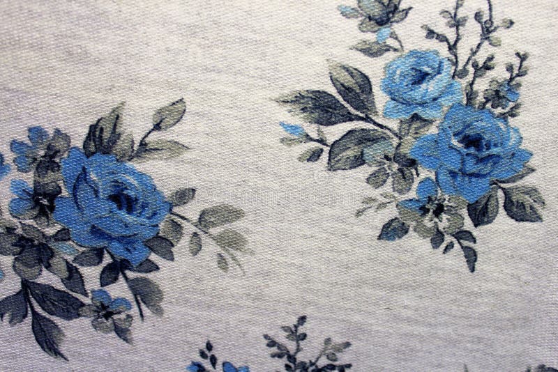 The Background Fabric is Grey with Blue Roses Stock Photo - Image of ...