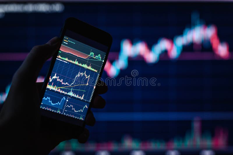 Background on a Financial Theme. Trader Charts on Smartphone Stock ...
