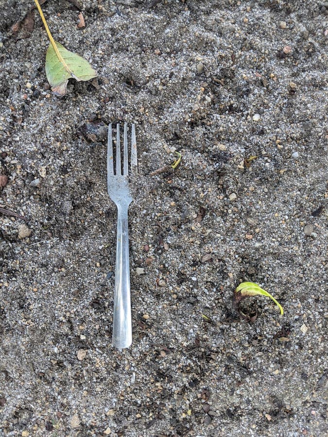 Background of a Fork on the Surface of the Sand. Top View Stock Image ...