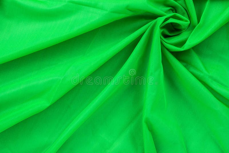 Background in the Form of Nylon Material of Bright Green Color with a ...