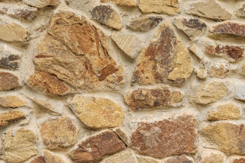 Background in the Form of a Stone Wall from Large Light Brown Stones ...