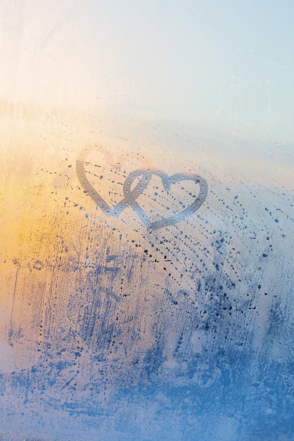 Background of Glass Window with Drawing Heart in Sunlight Stock Photo ...