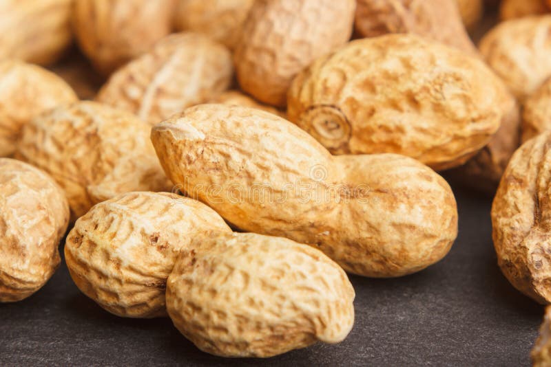 Background from Golden Peanuts in the Shells Stock Photo - Image of ...